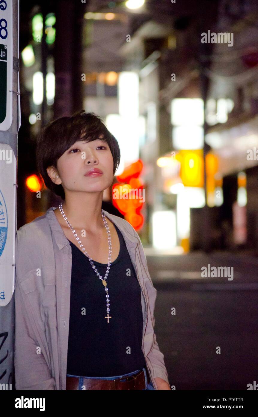 Japanese Girl poses on the street in Shimo-Kitazawa, Japan. Shimo ...