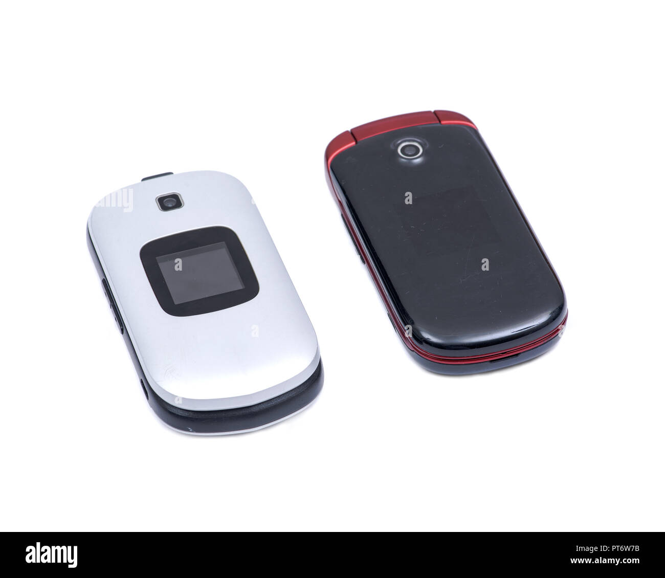 Old used flip cell phone isolated on white background Stock Photo - Alamy