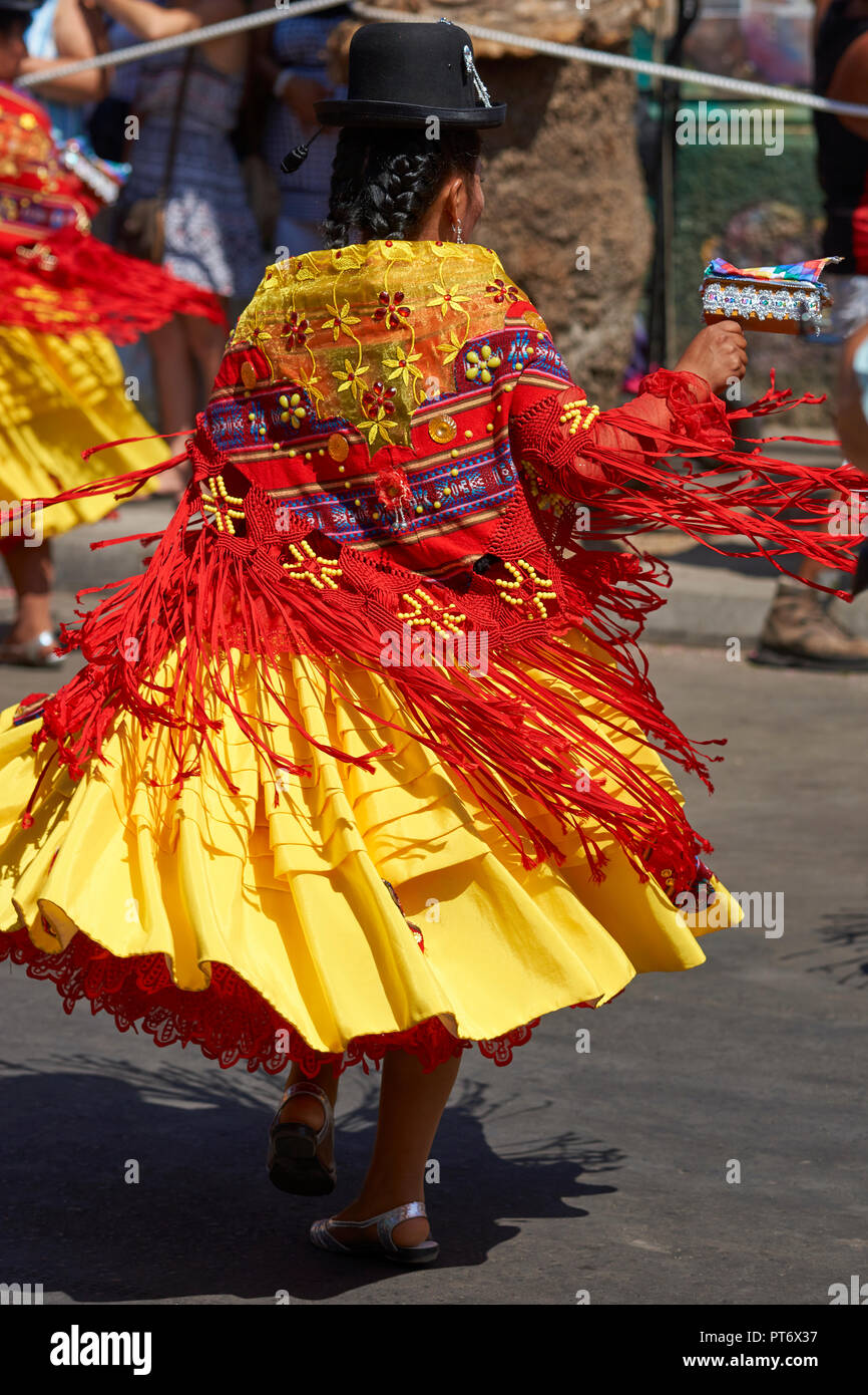 Lady in traditional Andean costume performing at the annual Carnaval ...