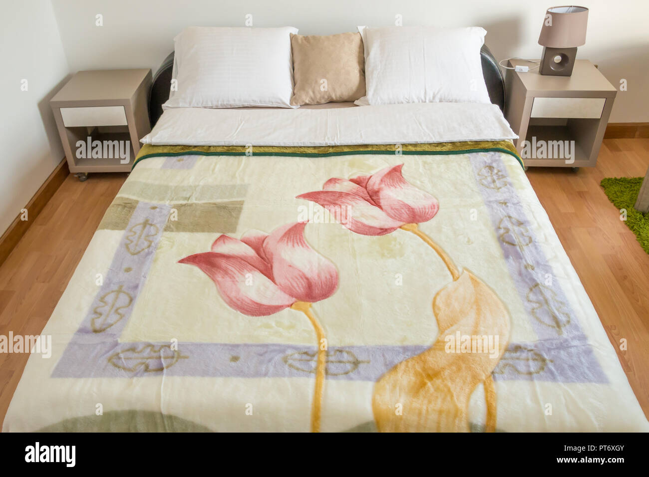 Front side of double bed. Modern hotel bedroom interior. Close up Stock ...