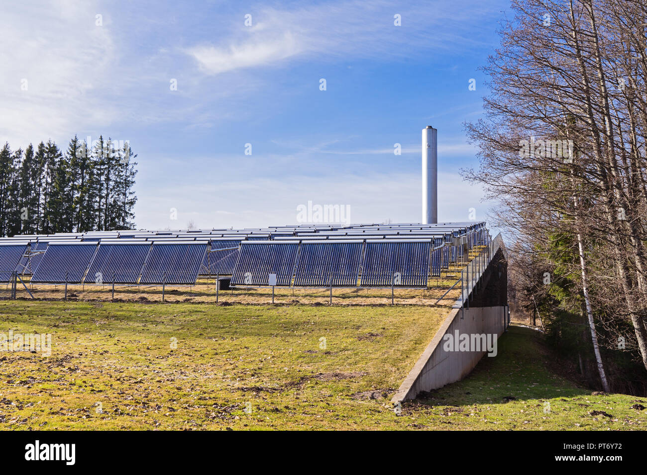 Solar panels on the field with a heat boiler room. Renewable solar ...
