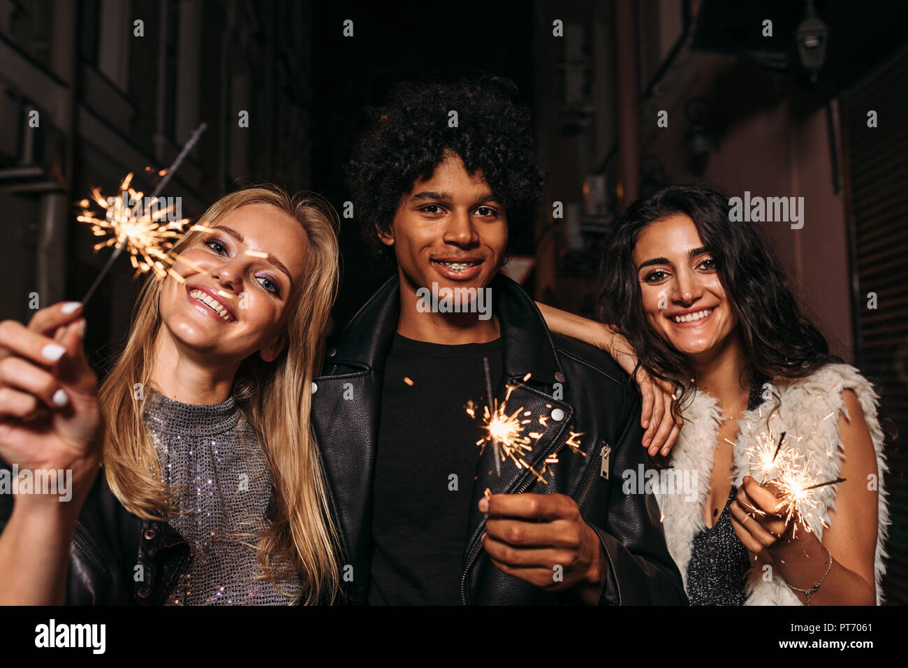 Group young people sparklers on hi-res stock photography and images - Alamy