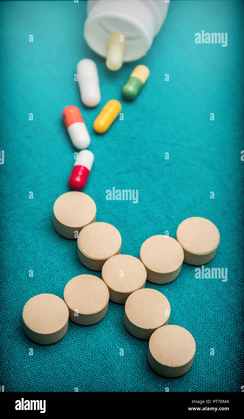 Many Medicines Pills Capsules Of Diferent Size Stock Photo - Alamy