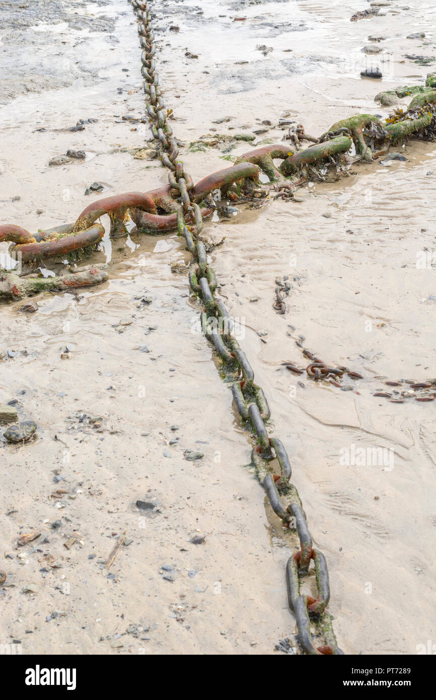 Old and rusty mooring chains. Metaphor strong links, strongest link ...