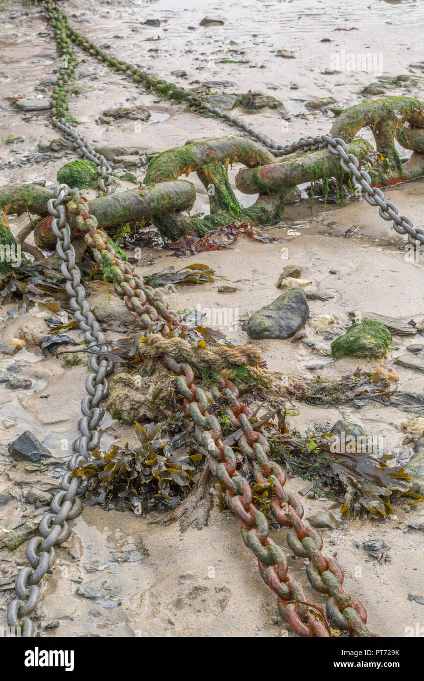 Old and rusty mooring chains. Metaphor strong links, strongest link ...