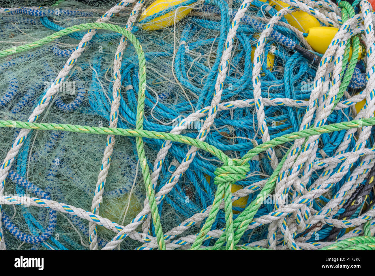 Tangled mass of fisherman's ropes. Metaphor 'given enough rope ...