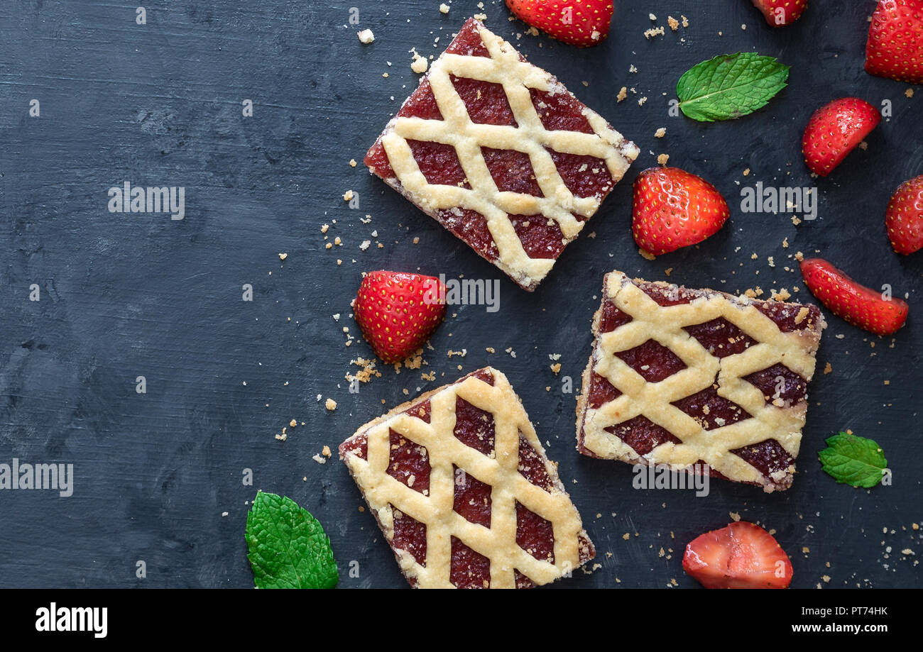 Strawberry cookies with strawberry fruits on dark background Stock ...