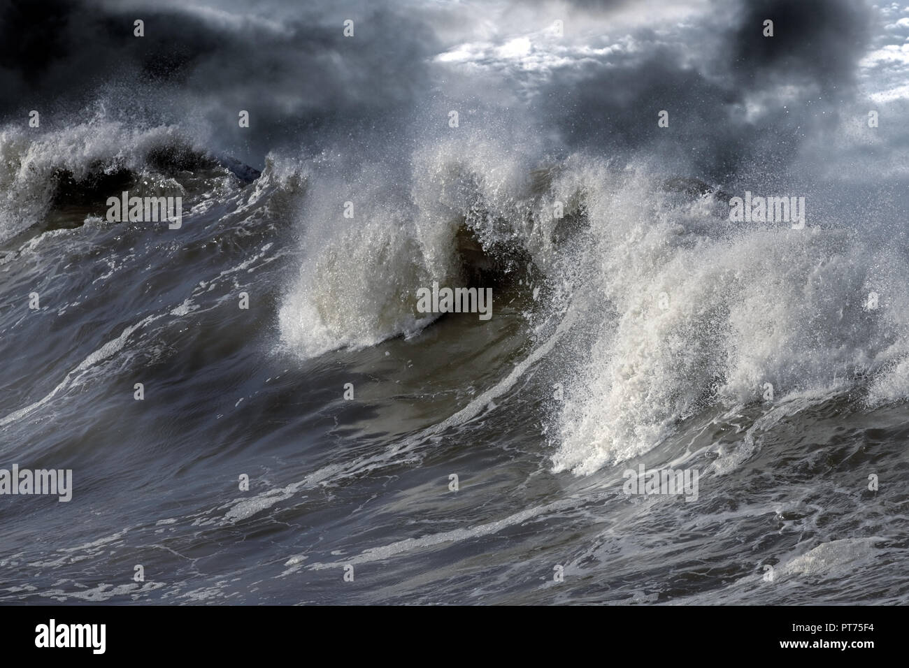 Big ocean stormy wave. Enhanced sky Stock Photo - Alamy