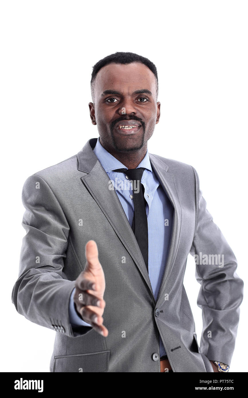 Smiling successful African American businessman giving hand Stock Photo ...