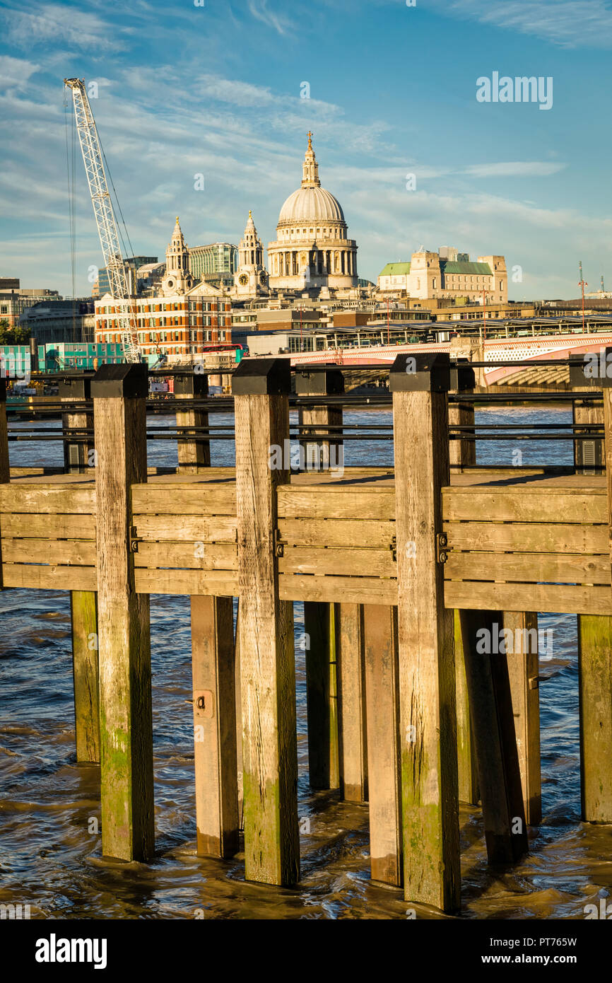 This is a picture of dock on the river Thames with St Paul's Catherdral ...