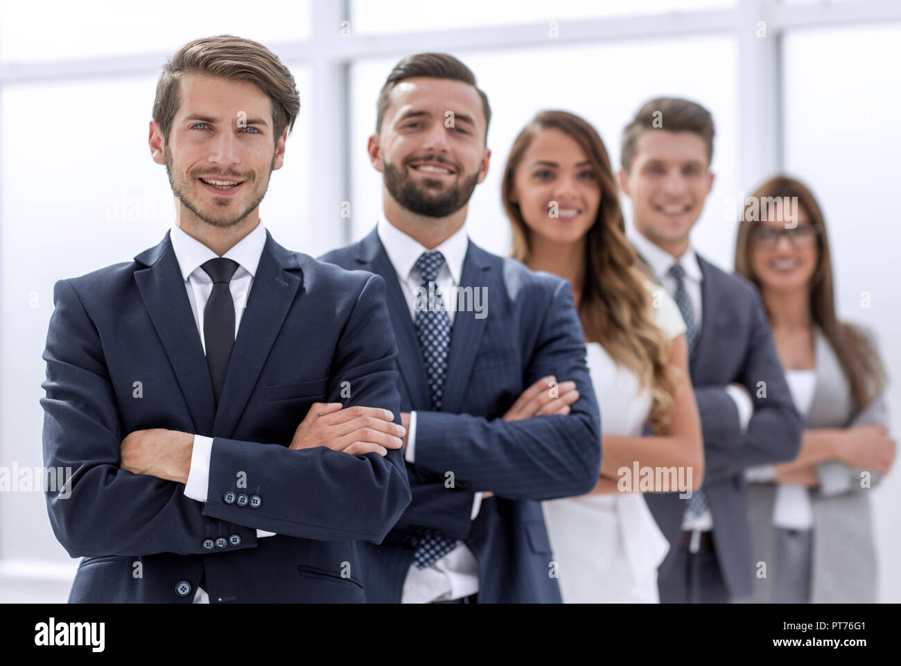 company employees standing together Stock Photo - Alamy