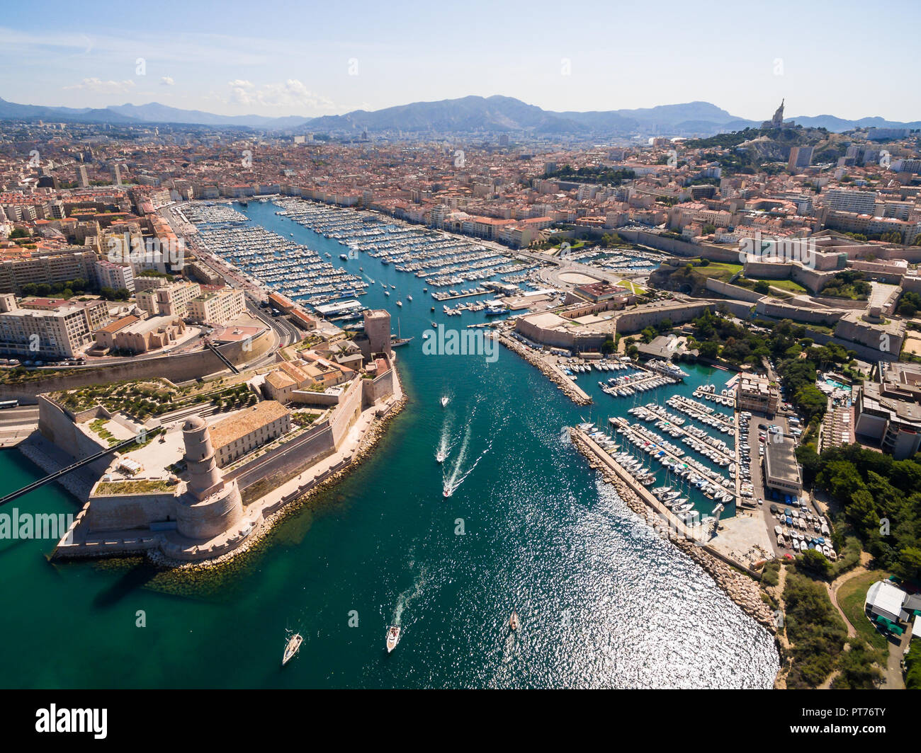 Aerial view of Marseille pier - Vieux Port, Saint Jean castle, and ...
