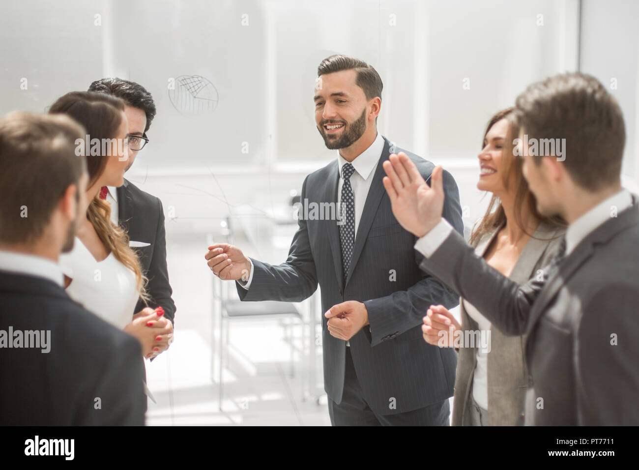close up.the project Manager talks to the business team Stock Photo - Alamy