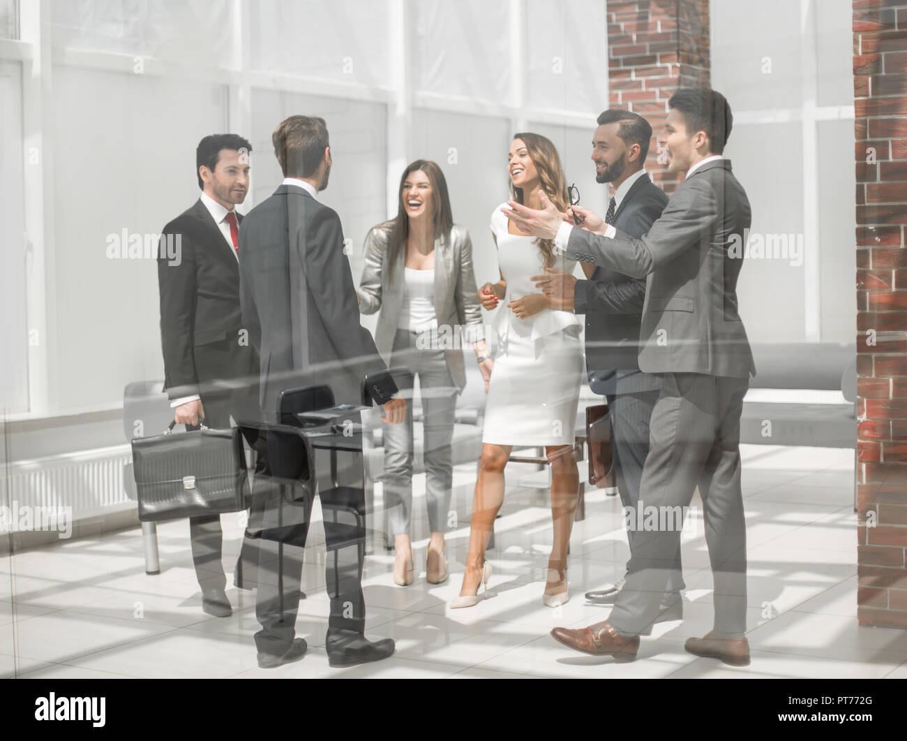 group of business people standing in the Bank hall Stock Photo - Alamy