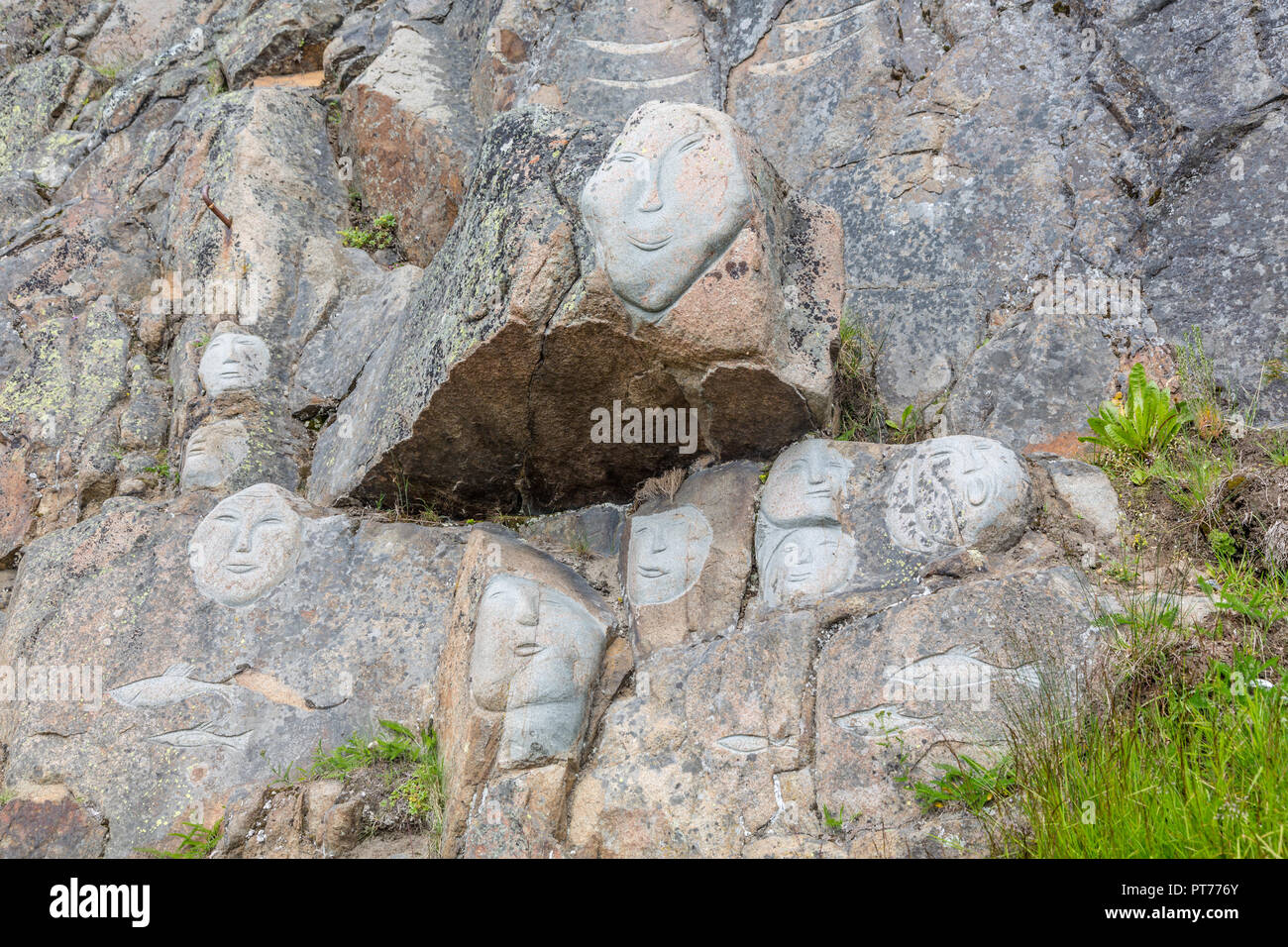 Faces on the rock face as part of the Stone & Man Sculpture, Qaqortoq ...