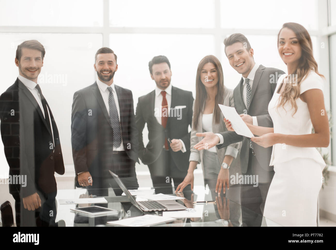 professional business team standing in the office Stock Photo - Alamy