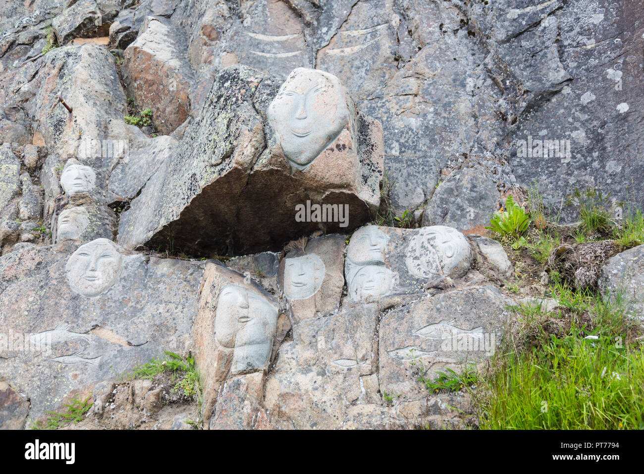 Faces on the rock face as part of the Stone & Man Sculpture, Qaqortoq ...