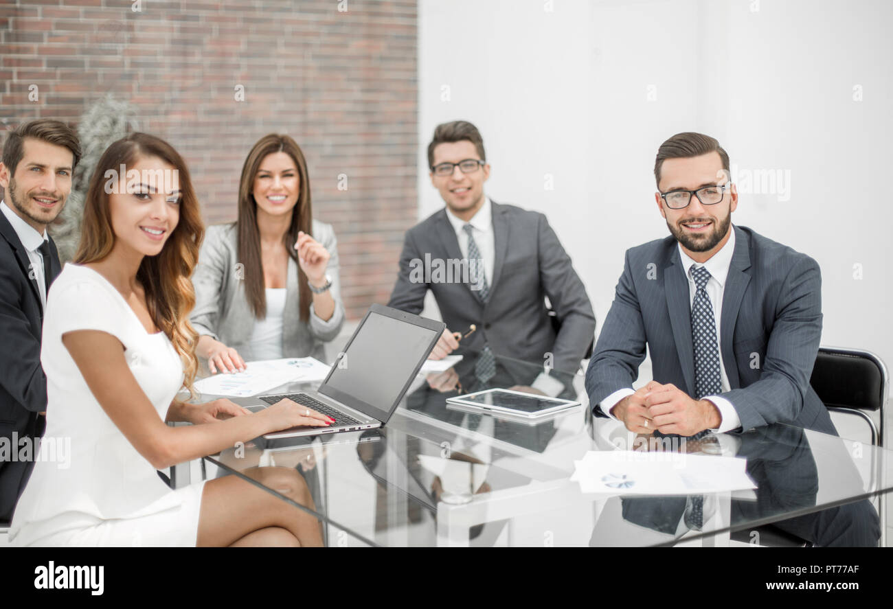professional business team sitting at the office Desk Stock Photo - Alamy