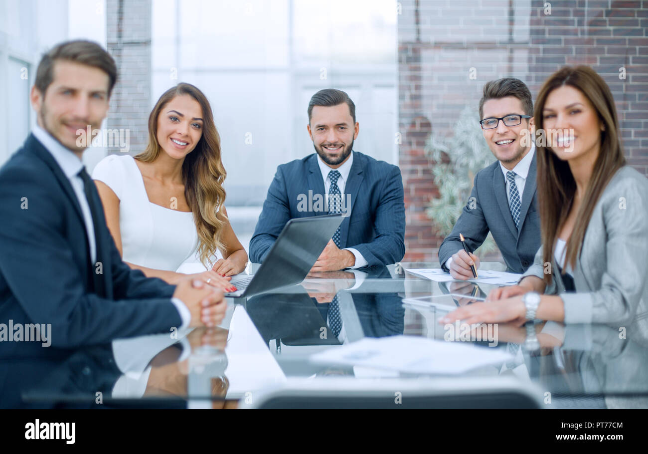 business Manager and employees at an office business meeting Stock ...