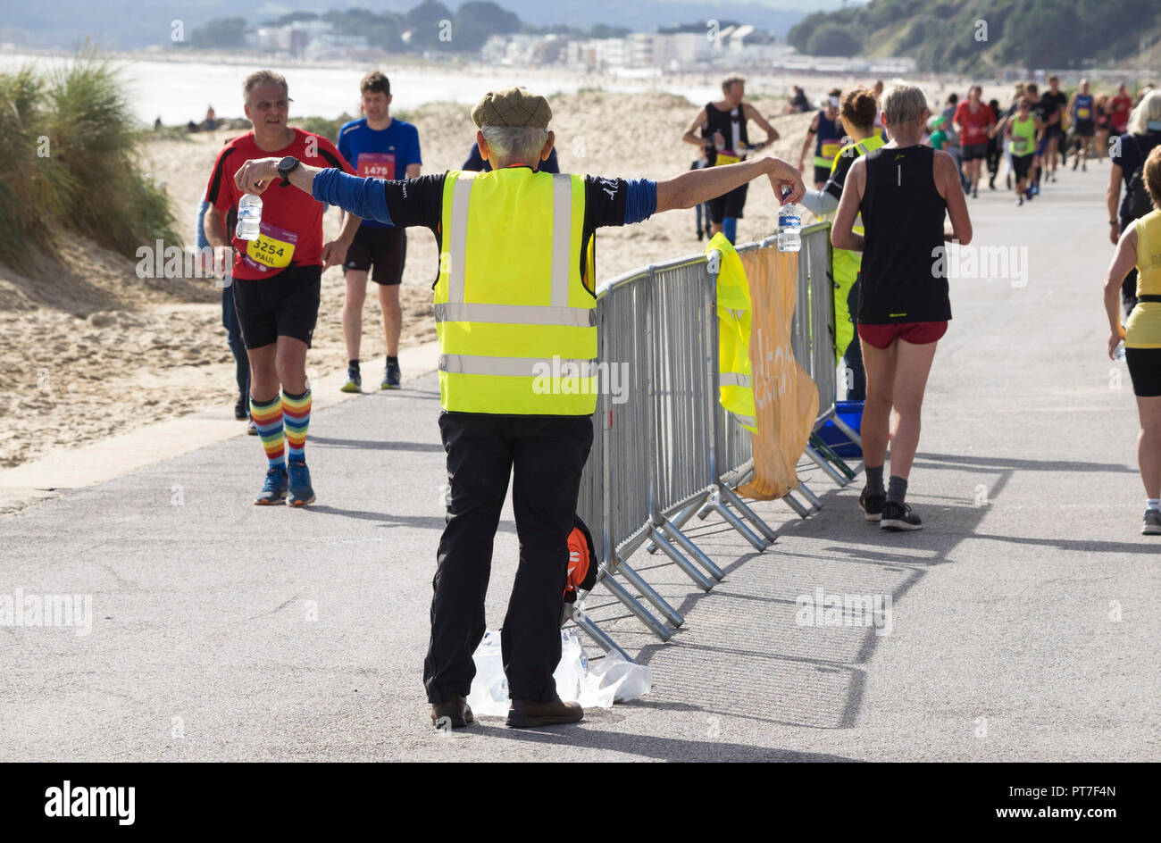 Marathon runners drink station in hi-res stock photography and images ...
