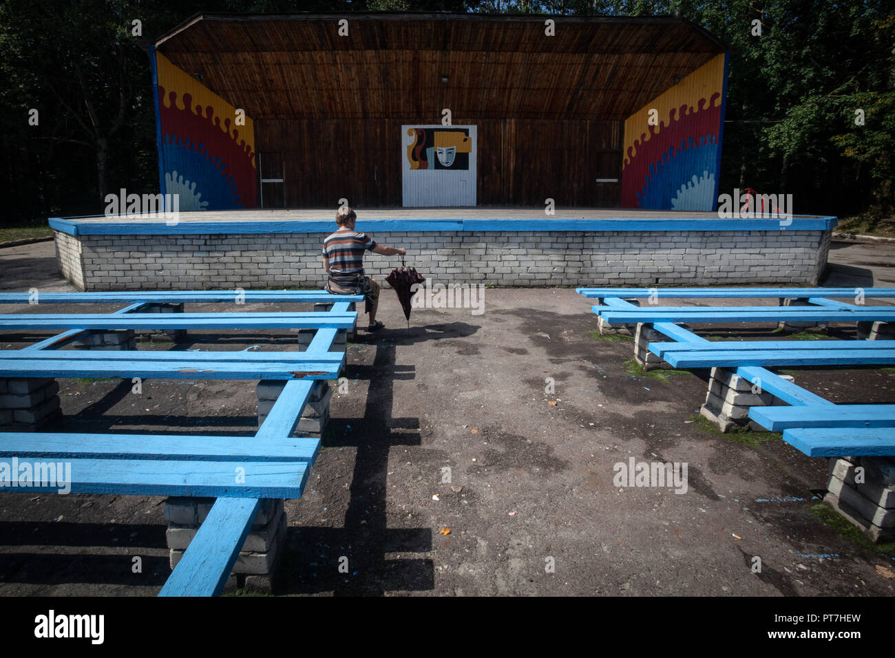 Bryansk, Russia. 20th Aug, 2012. A man seen playing with an umbrella ...