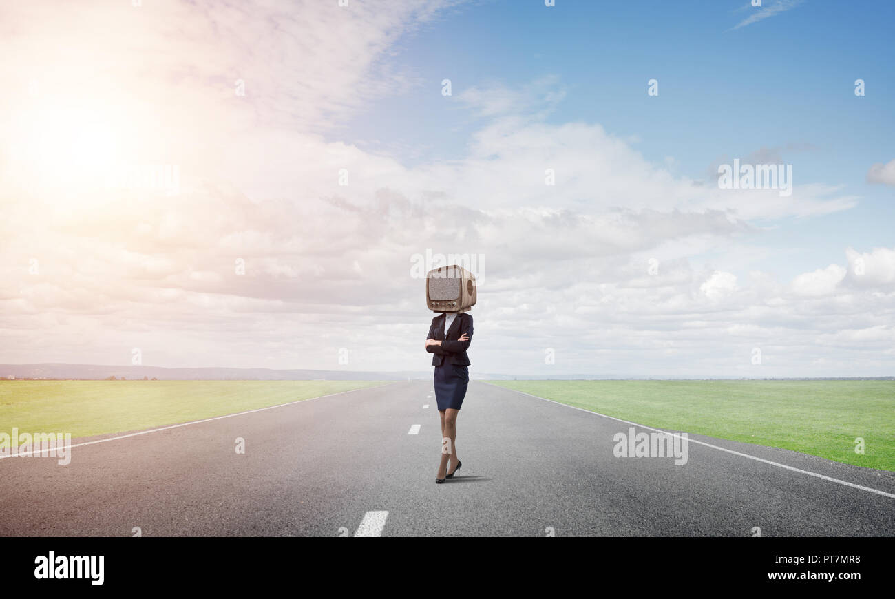 Business woman with an old TV instead of head Stock Photo - Alamy