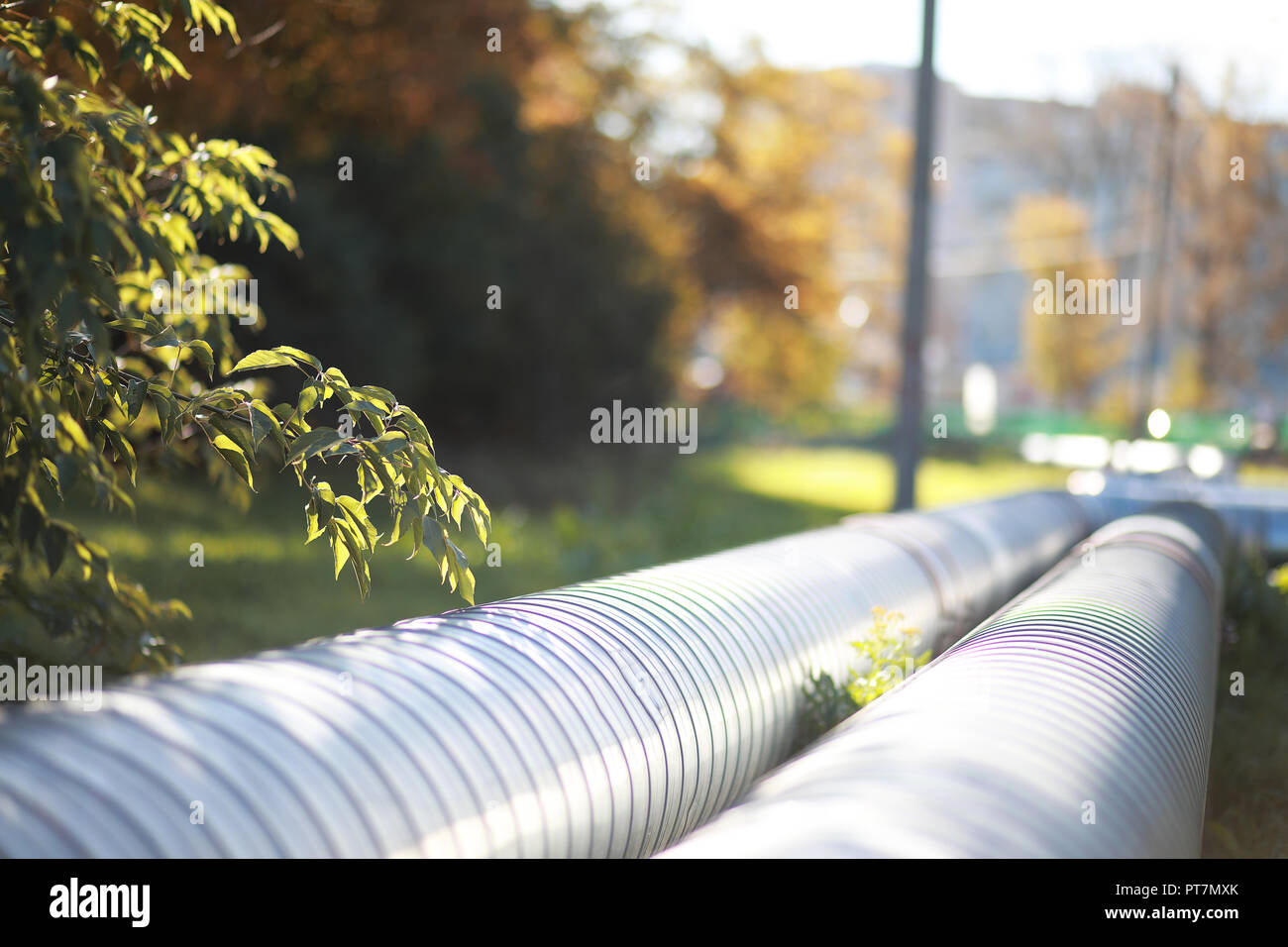 Industrial pipes on street construction Stock Photo - Alamy