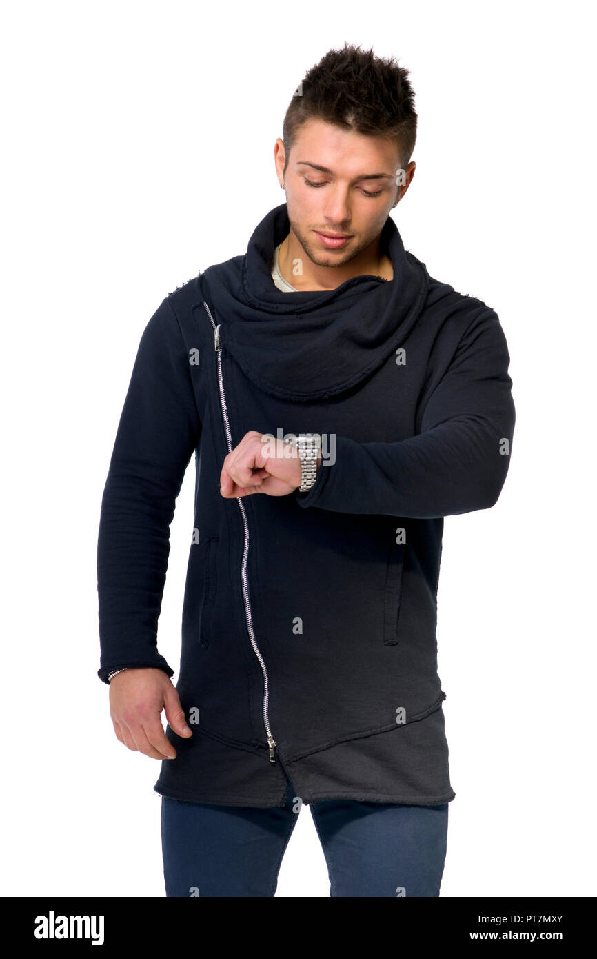 Handsome young man checking watch on his wrist Stock Photo - Alamy