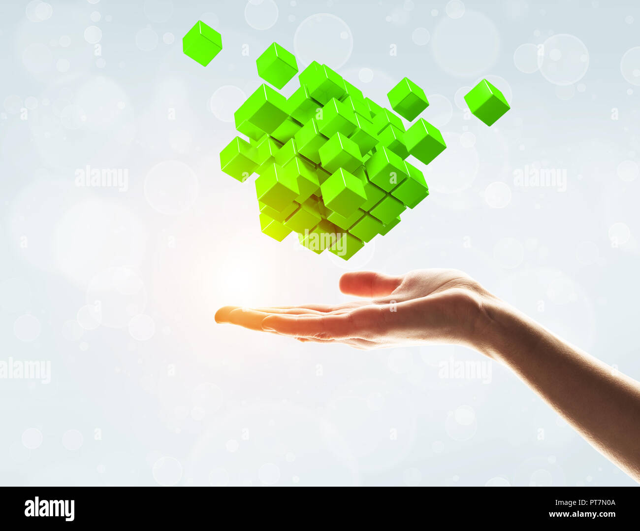 Cube color figure in male palm as symbol for integration. 3D rendering ...