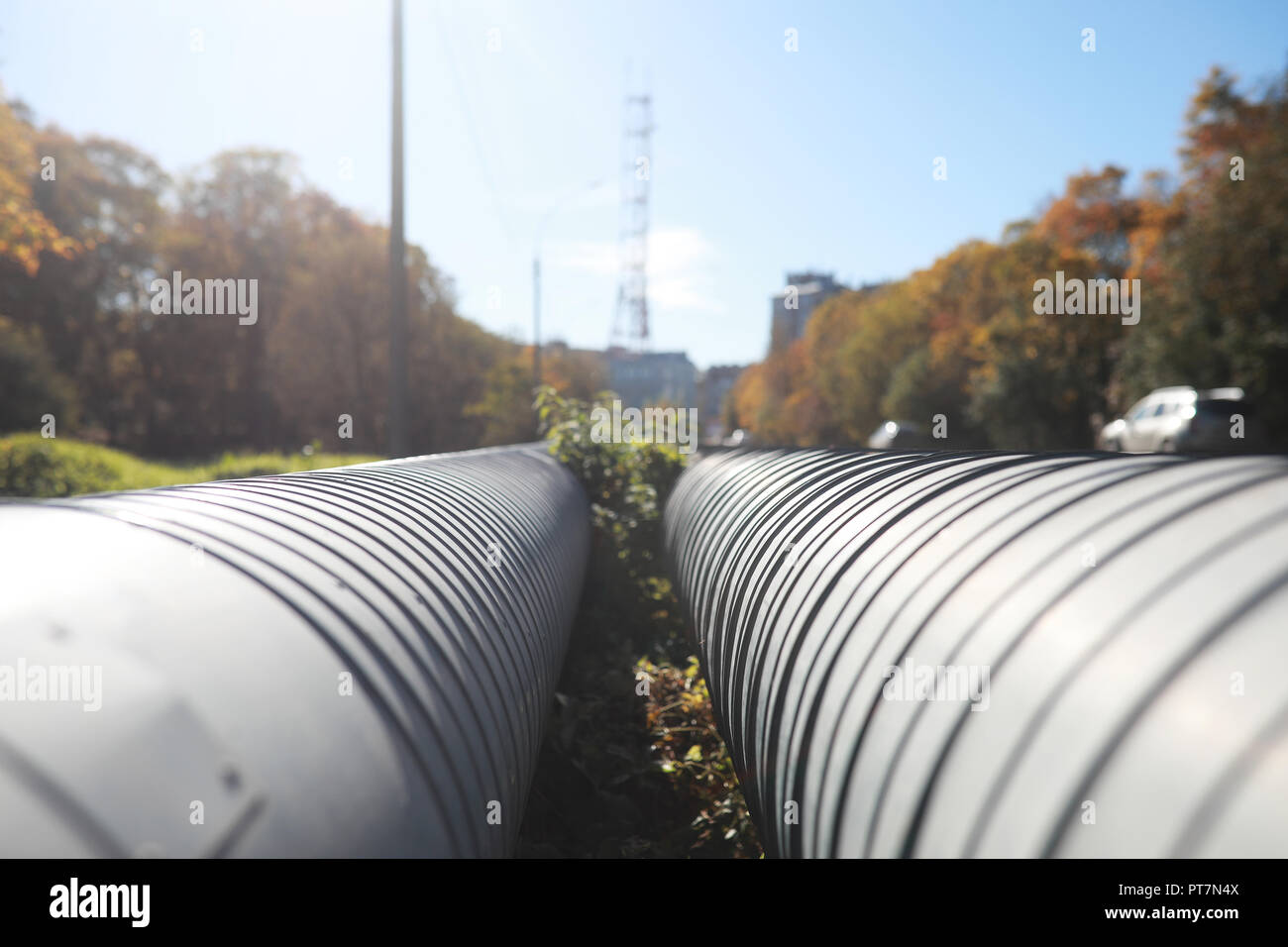 Industrial pipes on street construction Stock Photo - Alamy