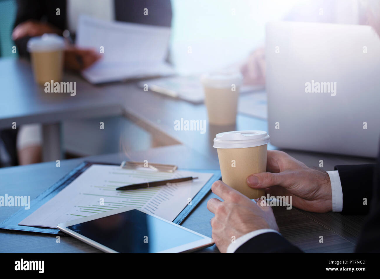 Businessman takes a break during a meeting Stock Photo - Alamy