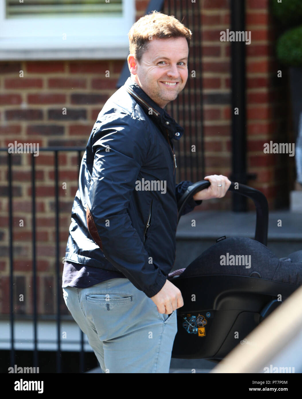 Declan Donnelly and his wife Ali Astall arrive home with their new baby ...