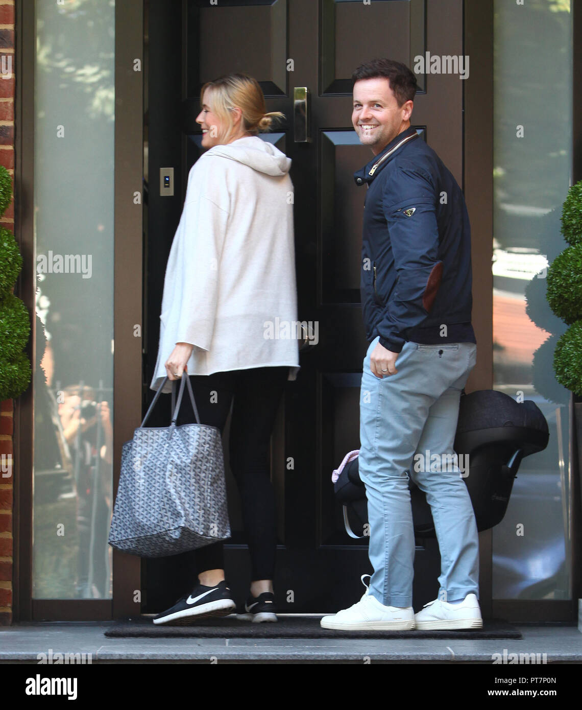 Declan Donnelly and his wife Ali Astall arrive home with their new baby ...