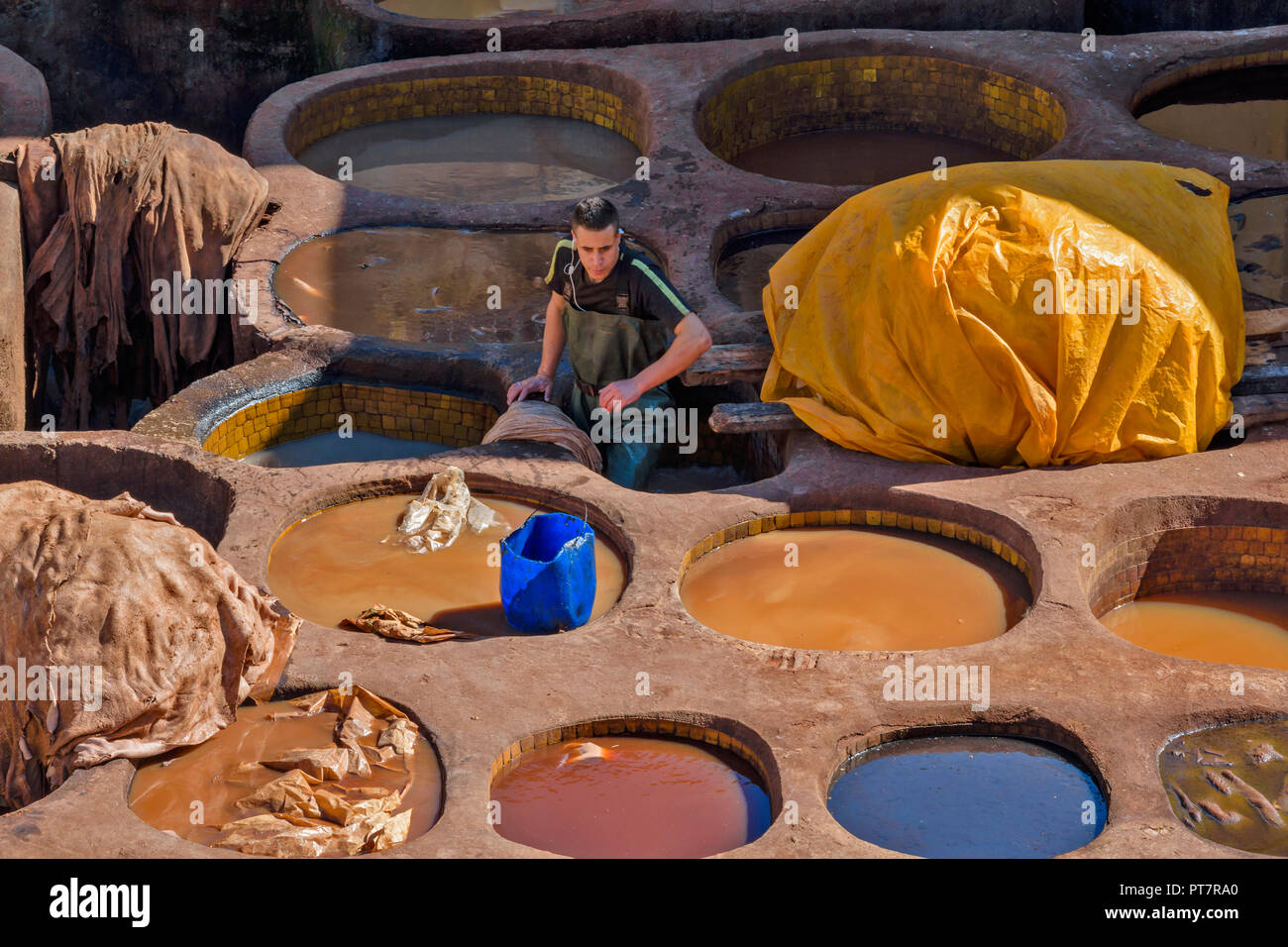 MOROCCO MARRAKESH LEATHER TANNERY WITH VATS OF COLOURED DYES AND TANNER ...