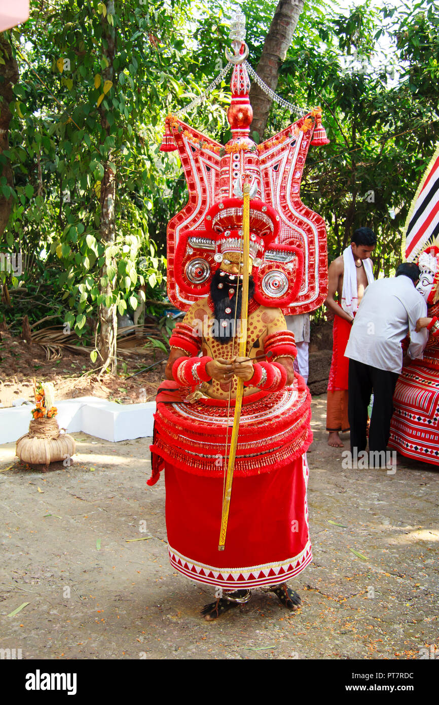 THEYYAM FESTIVAL NORTH MALABAR KANNUR KERALA INDIA GOD WITH ARROW AND ...