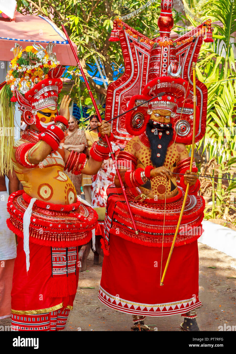 THEYYAM FESTIVAL NORTH MALABAR KANNUR KERALA INDIA TWO GODS WITH BOWS ...