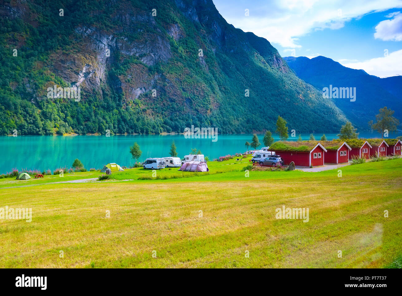 Norwegian camping landscape with fjord, mountains with clouds and ...