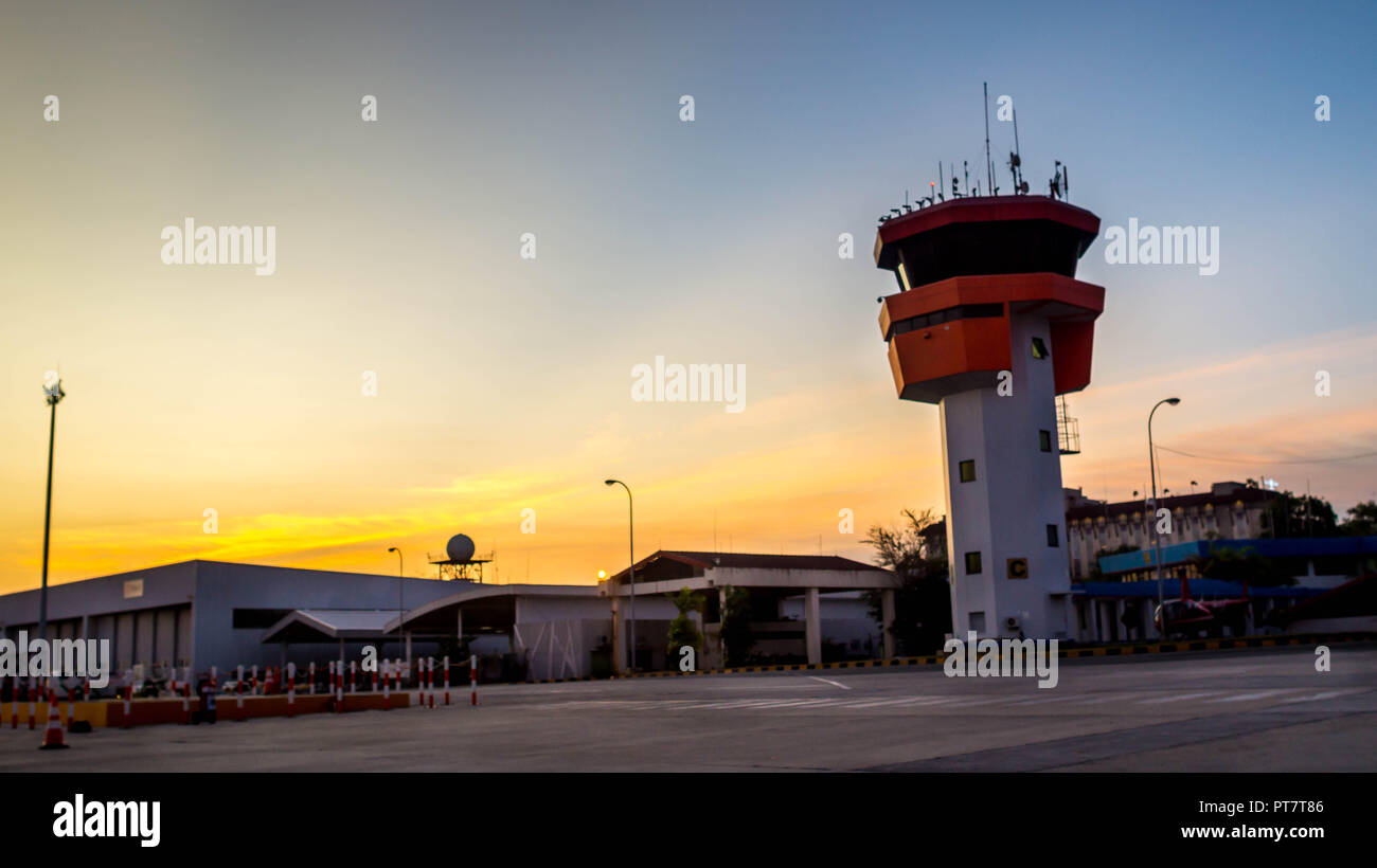 Air traffic control tower in the airport at sunset / sunrise Stock ...