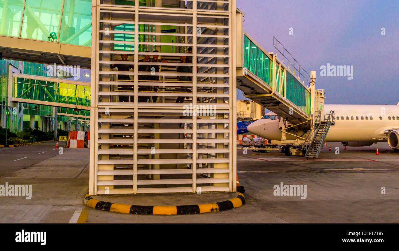 a plane is prepared before take off. boarding passenger, fueling ...