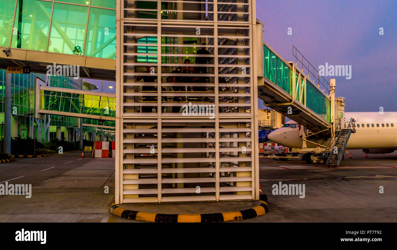 a plane is prepared before take off. boarding passenger, fueling ...