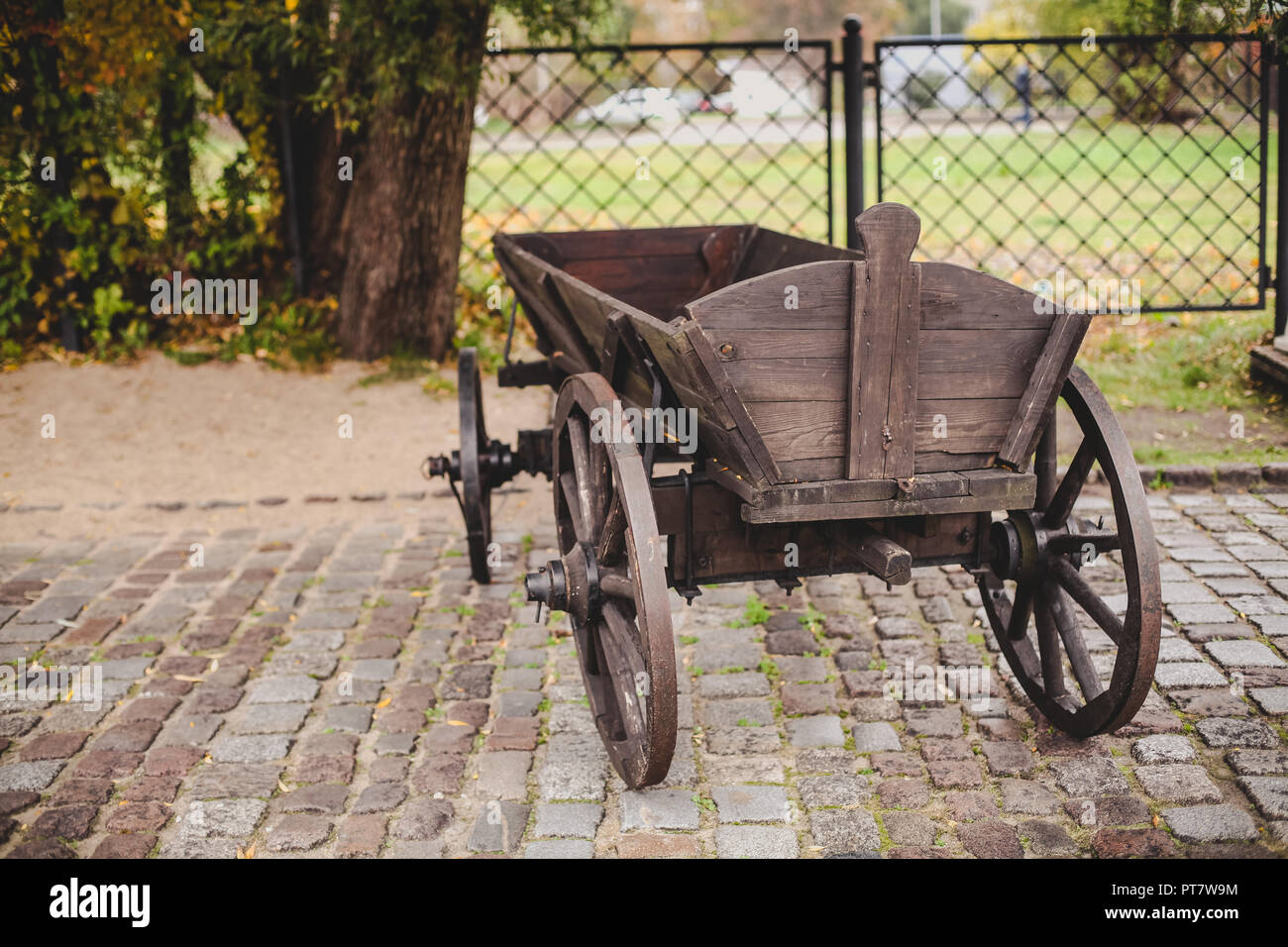 photo of the sides of a village wooden cart. The cart is standing ...
