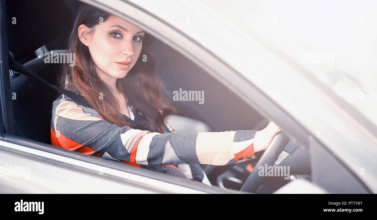 Girl driving a car bad emotions Stock Photo - Alamy