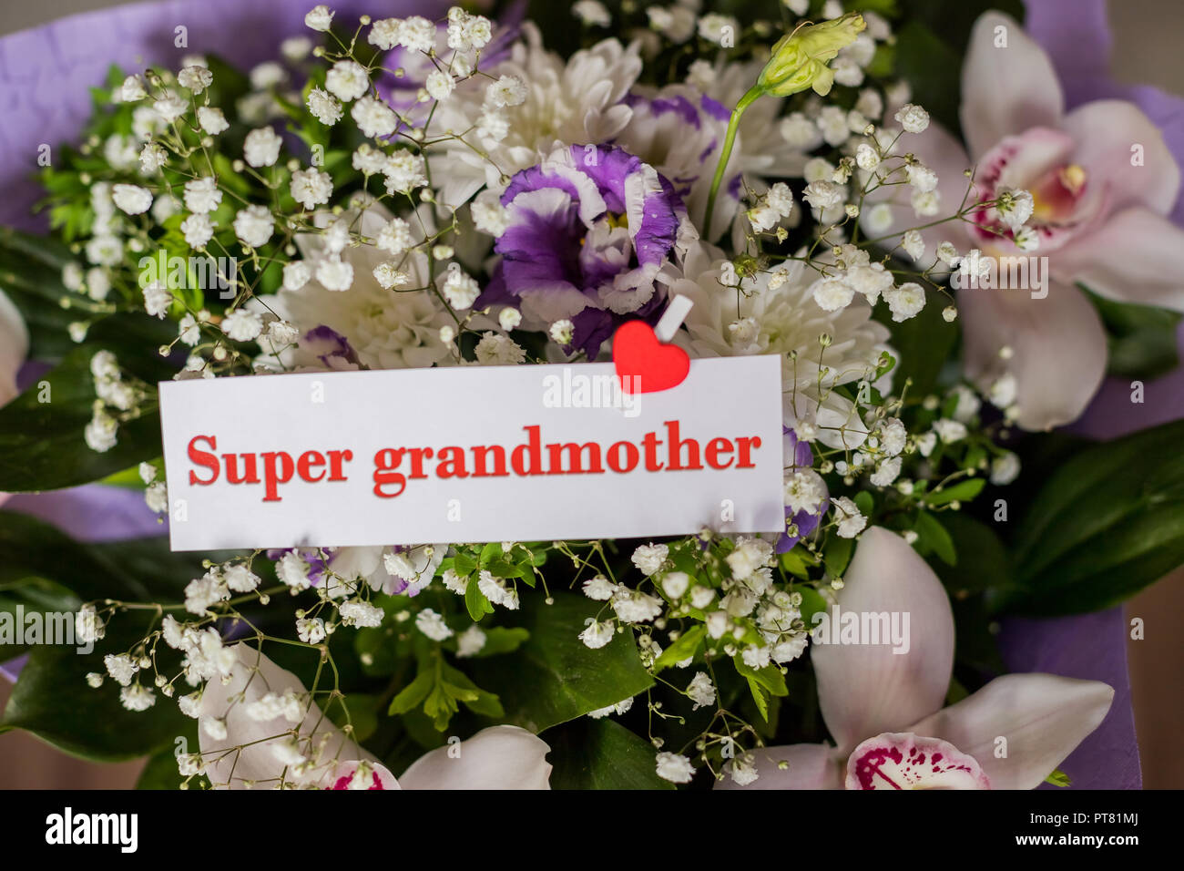 Heart-shaped word GRANDMA, page for Your inscription on the flowers ...