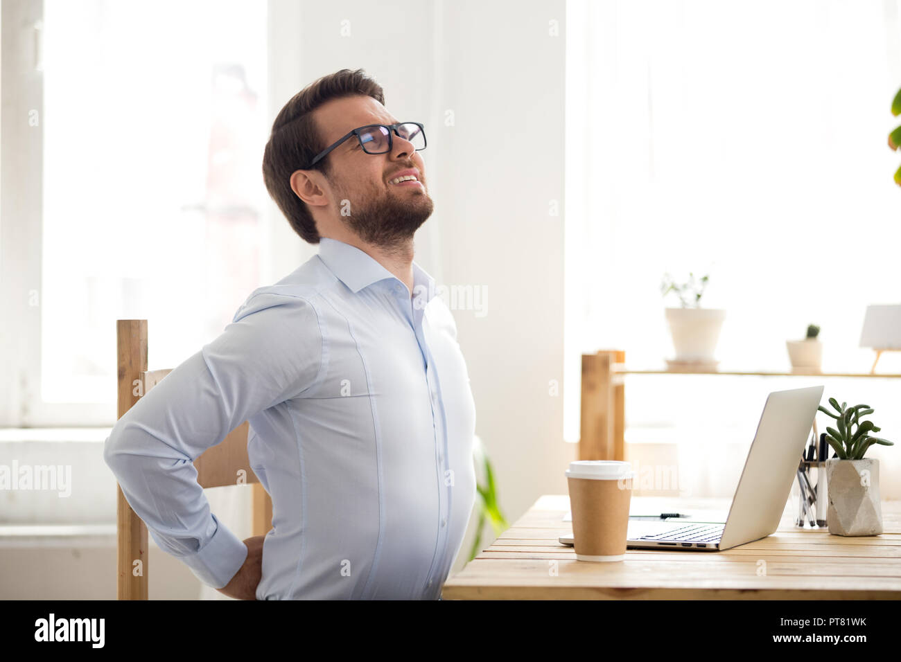 Backache hi-res stock photography and images - Alamy