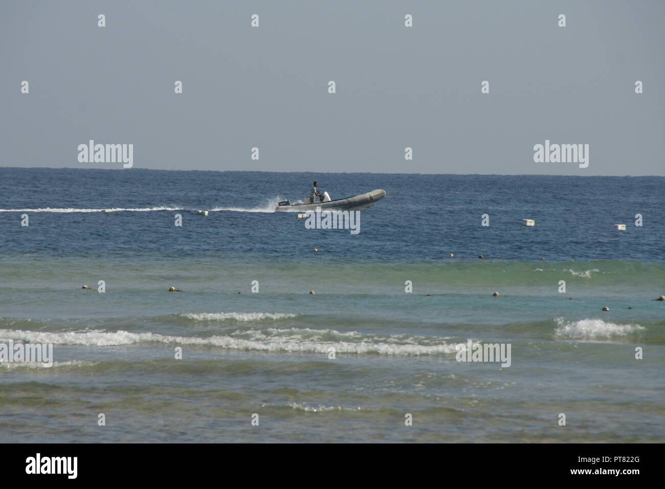 Speed boat on Red Sea coral riffs for diving and infrastructure Stock ...