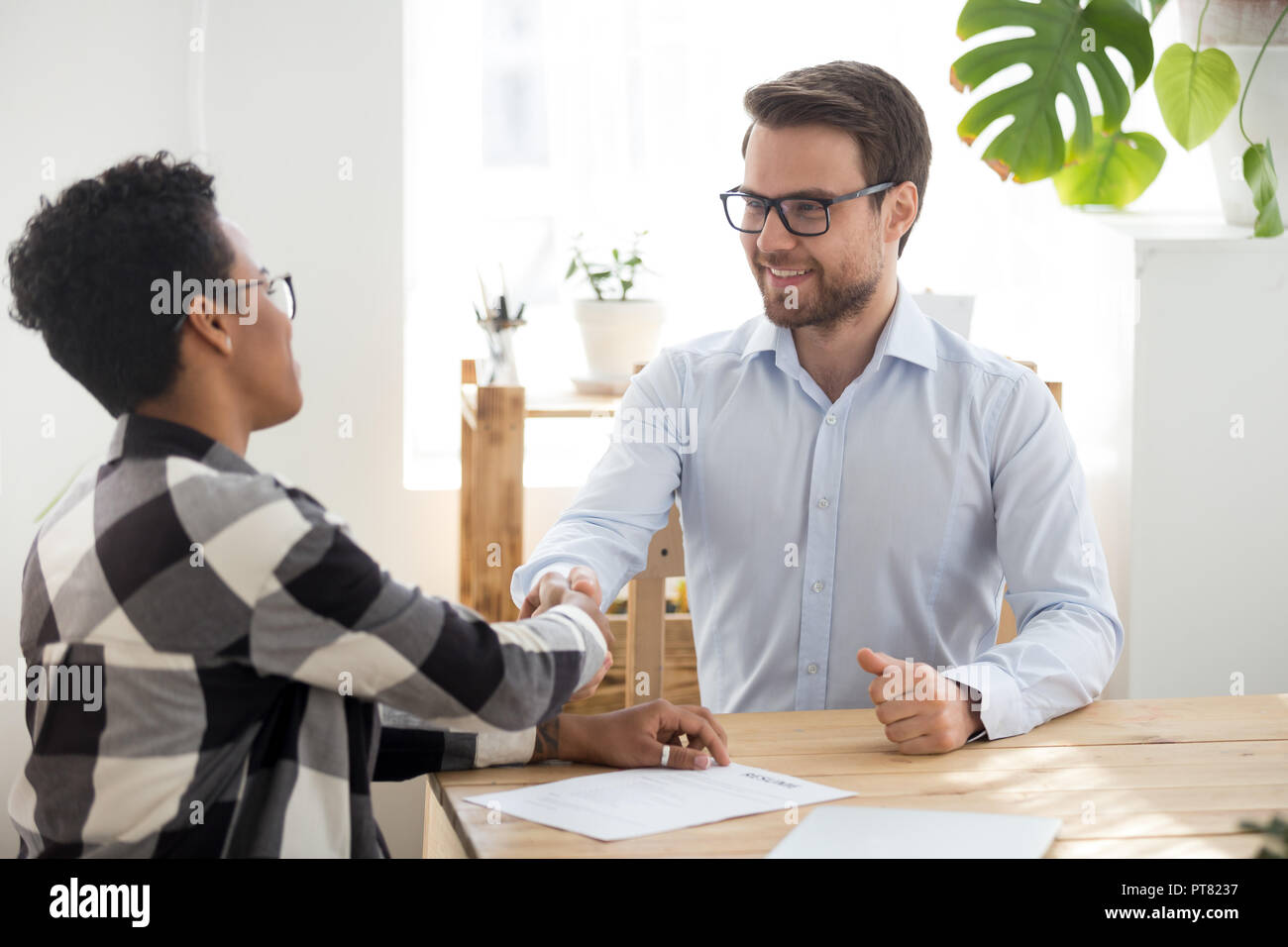 Handshake cv successful interview hi-res stock photography and images - Alamy