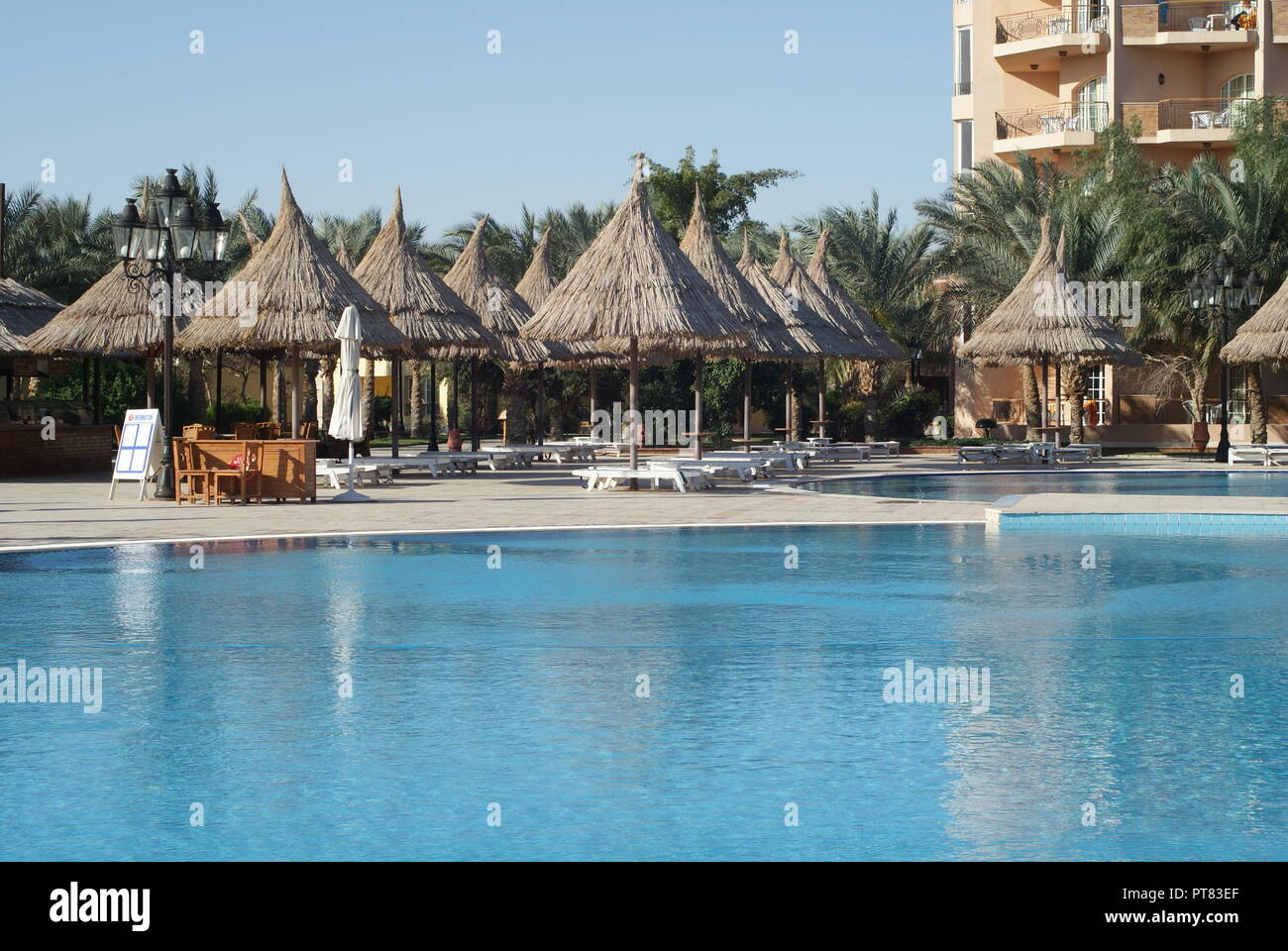 all inclusive hotel with blue swimmingpool and bar into the pool great ...