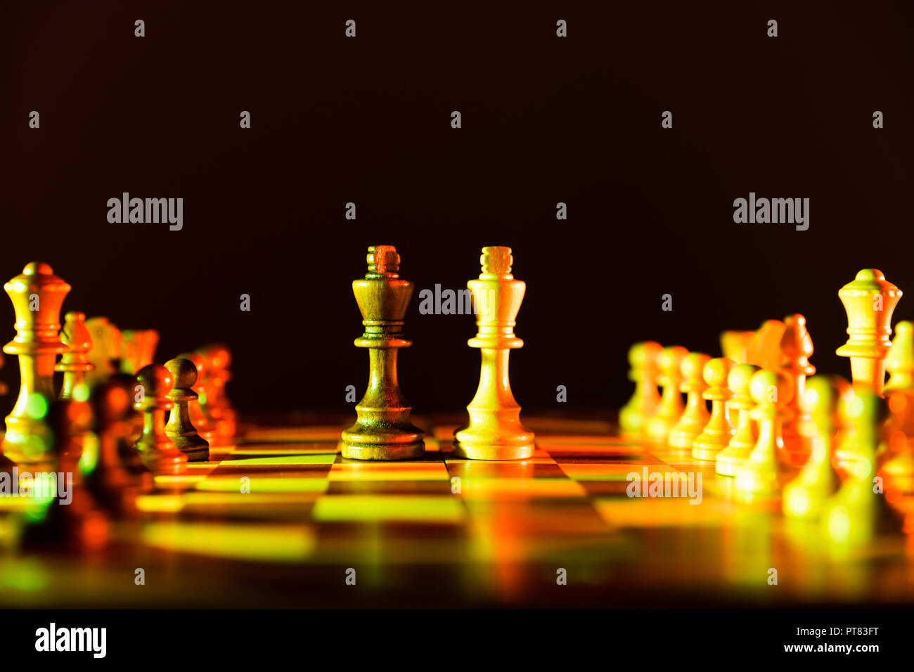Chess game two kings in centre of board other pieces lined up. In ...
