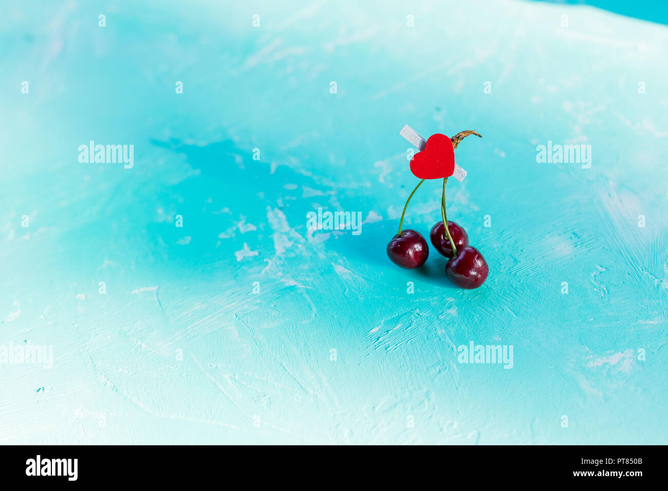 I love cherries on white. Clipping path included.Motivation concept ...