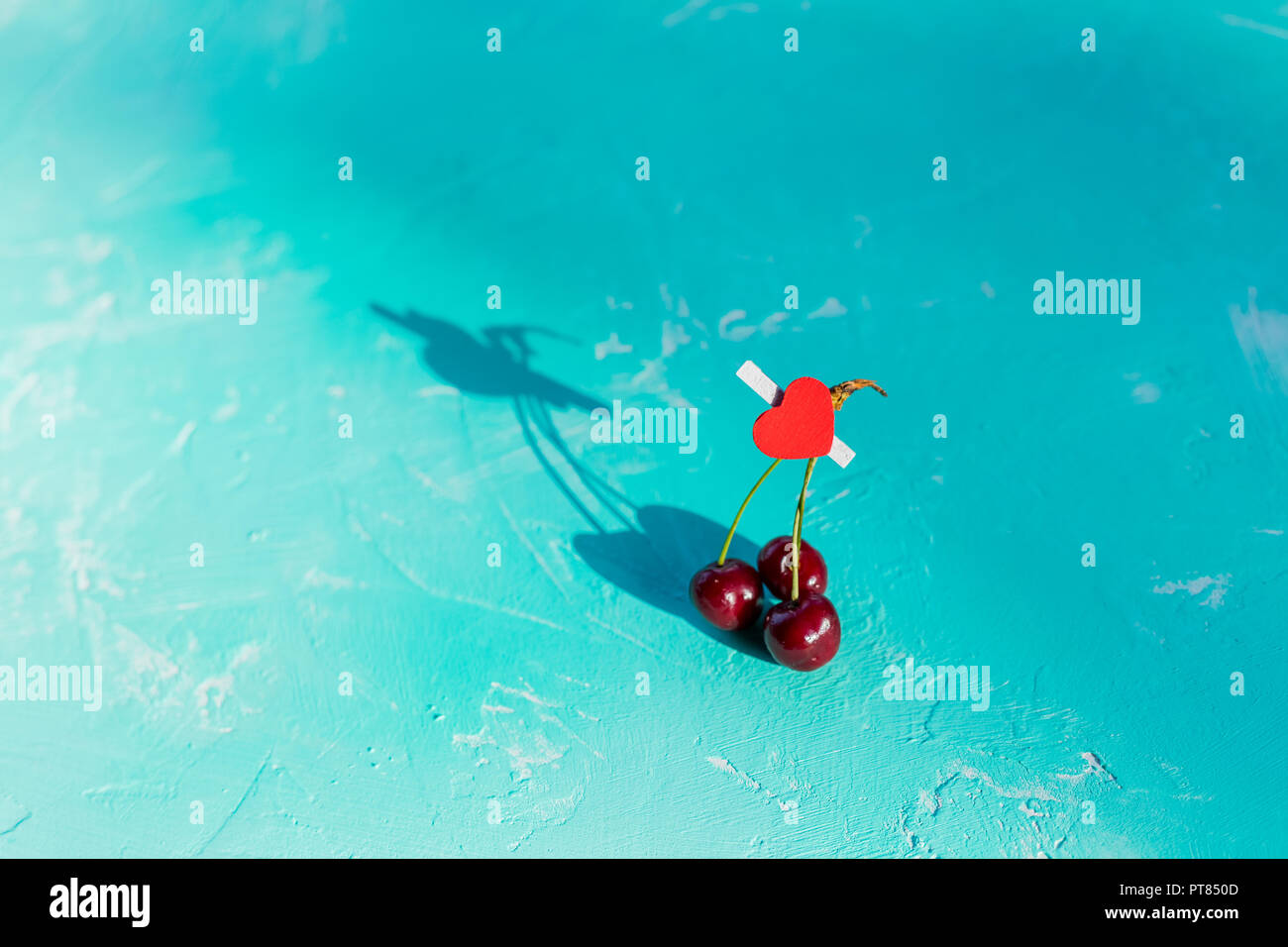 I love cherries on white. Clipping path included.Motivation concept ...